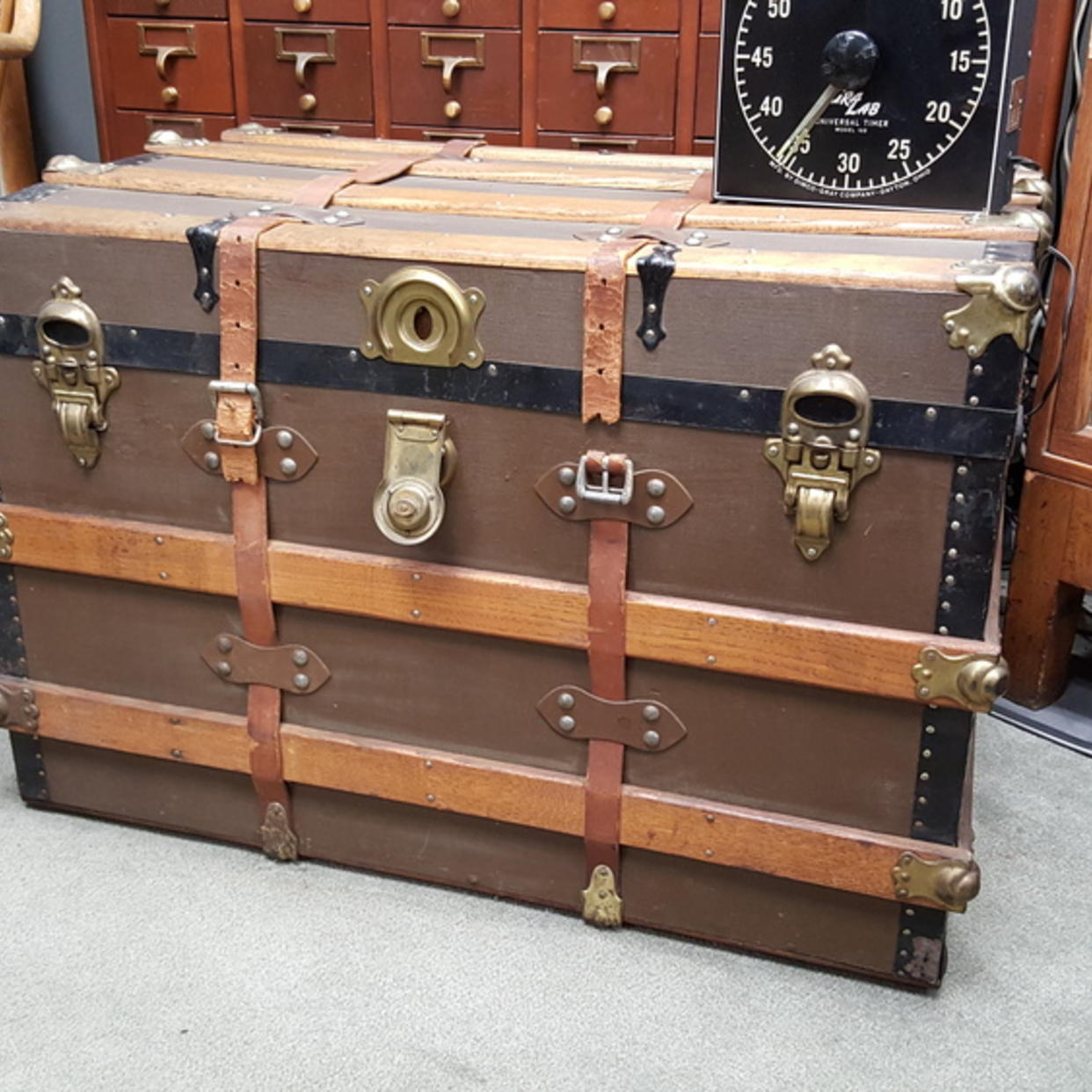 Vintage large steamer trunk with leather straps | Peg Leg Vintage ...